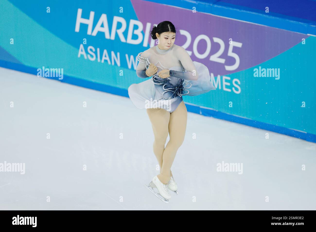 Harbin,China.12th February 2025. An Xiangyi of China competes in the ...