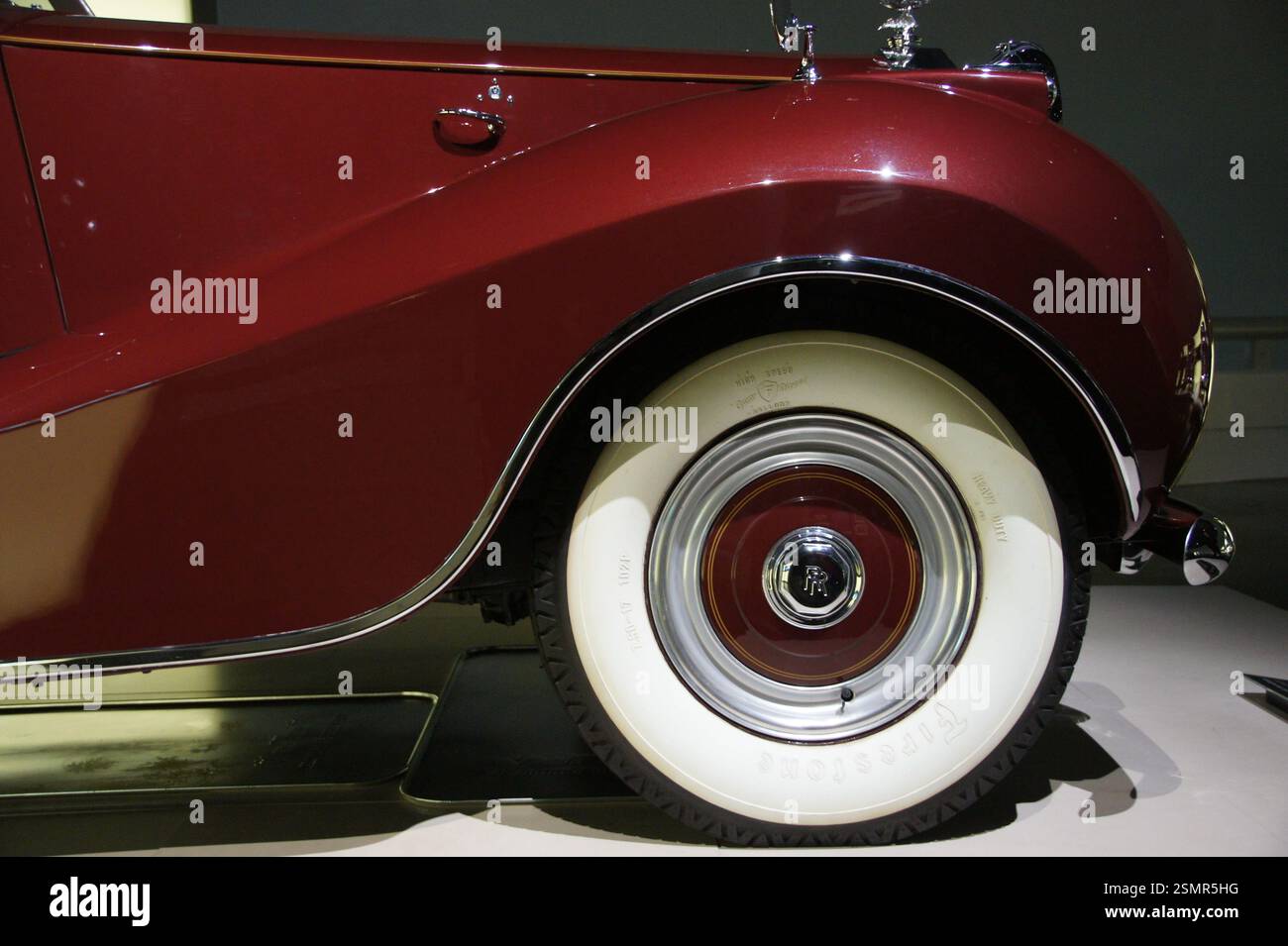 A vintage car with white wall tires gleams on display in Germany ...