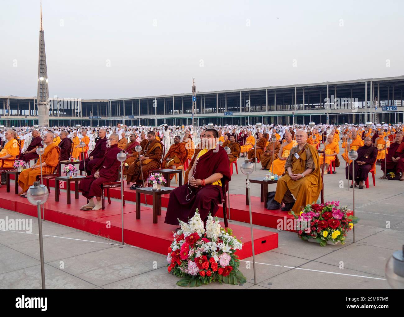Monks sit during Makha Bucha Day ceremonies at Wat Phra Dhammakaya ...