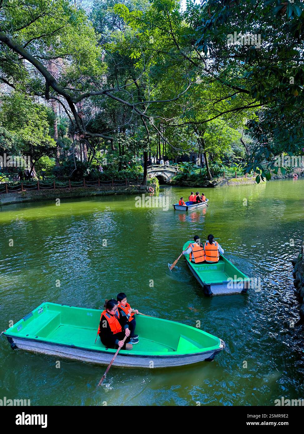 People enjoy early spring time at a park in Chengdu City, southwest ...