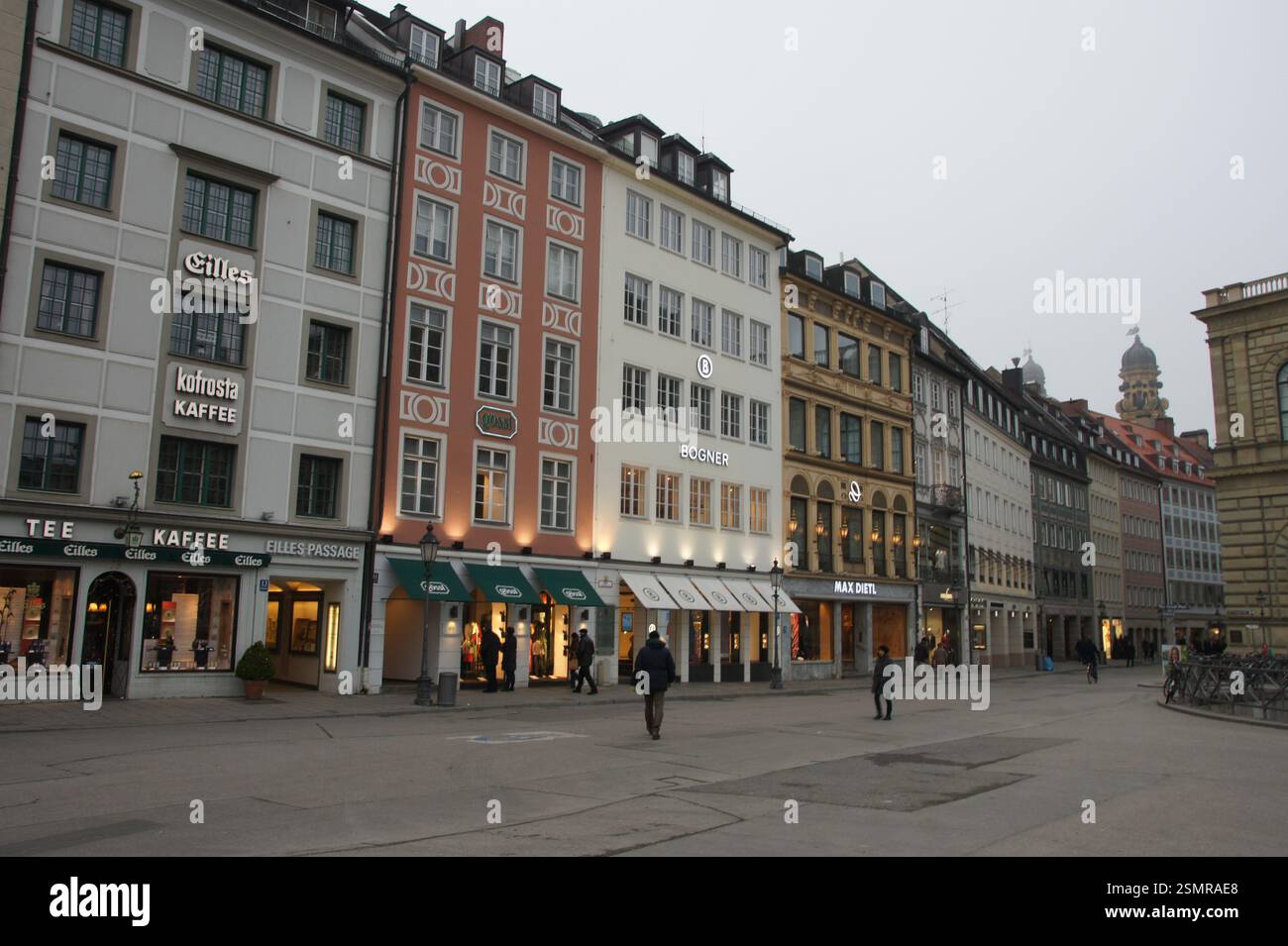 Munich, Germany, boasts a scenic street lined with historic buildings ...