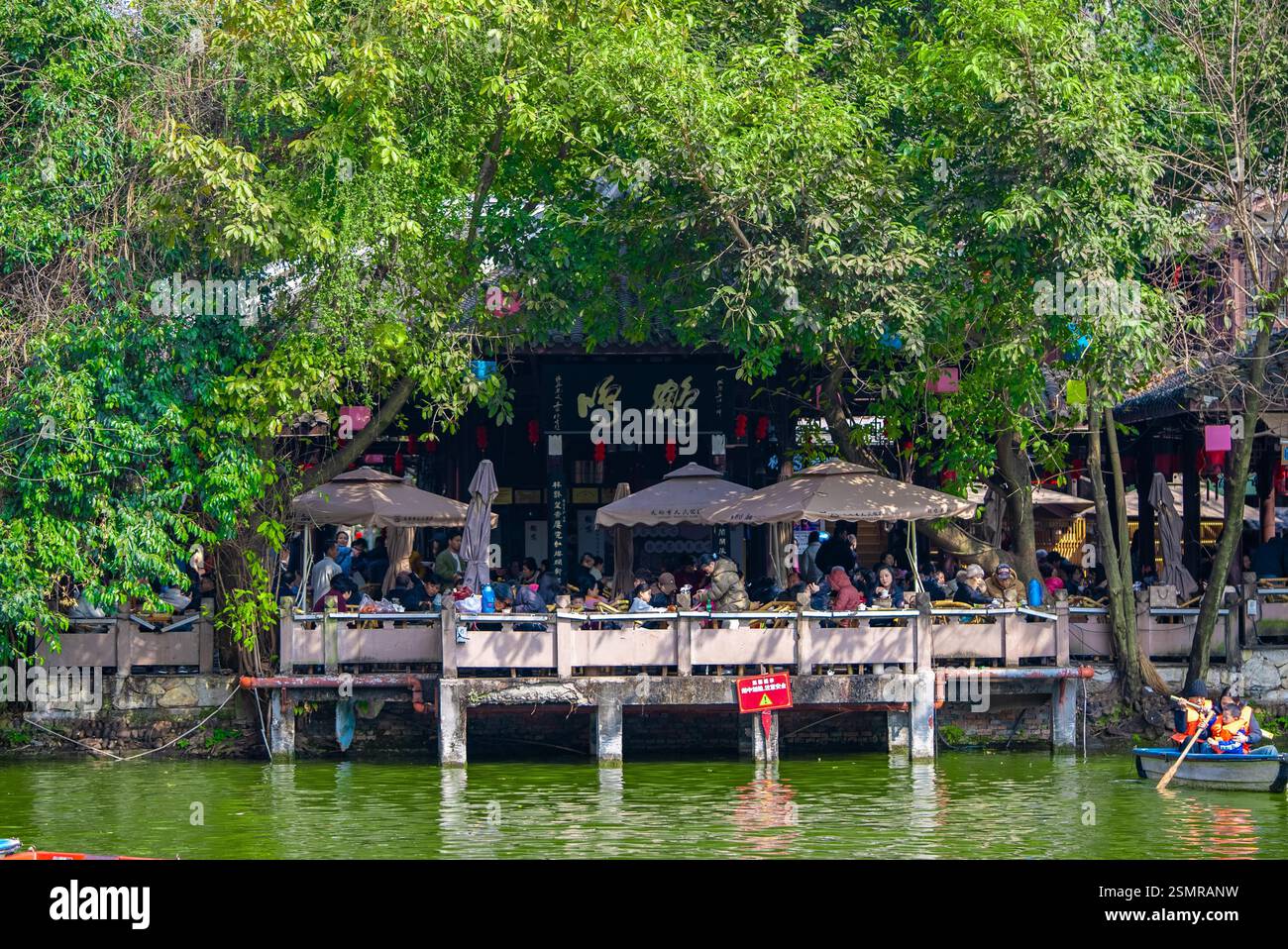 People enjoy early spring time at a park in Chengdu City, southwest ...