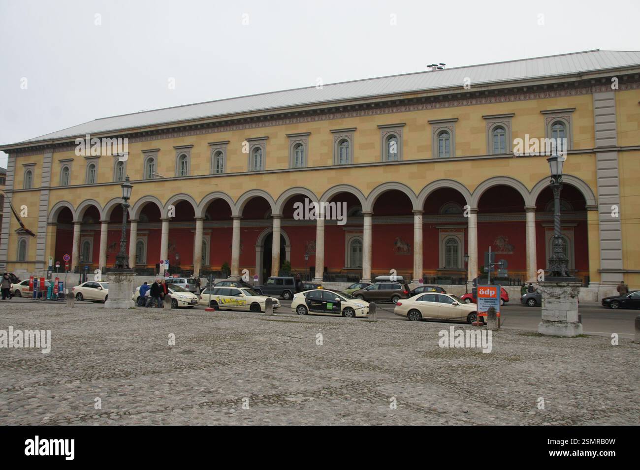 Luxury cars parked in front of the Palais Toerring-Jettenbach, a ...