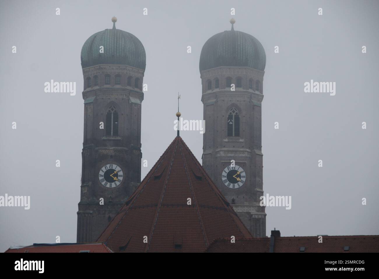 Two green onion-shaped domes pierce through fog, revealing the landmark ...