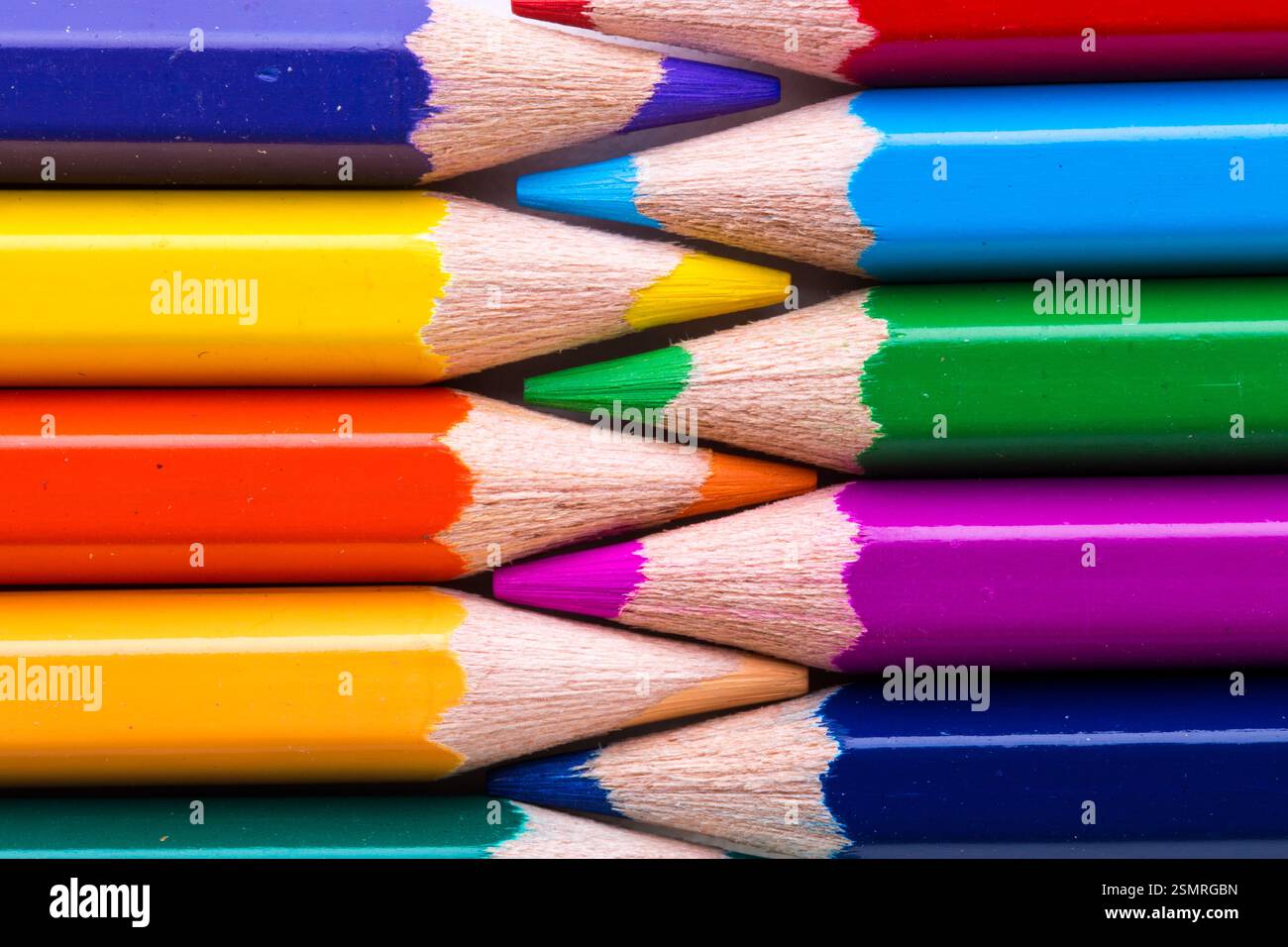 Colorful arrangement of colored pencils in various shades and hues ...