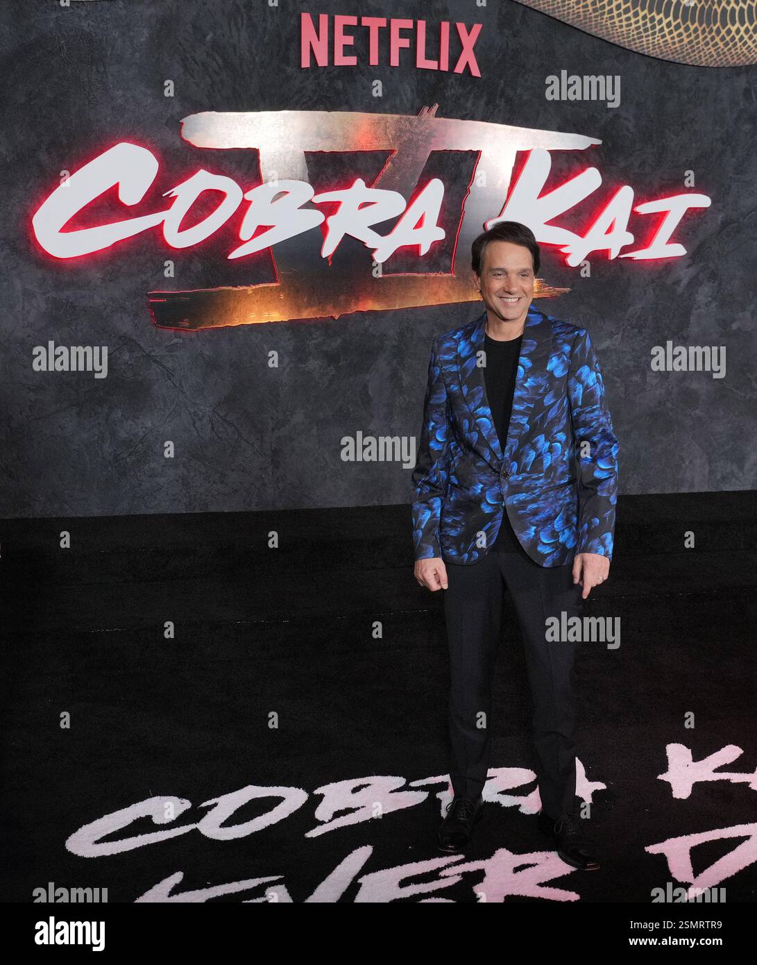 Los Angeles, USA. 12th Feb, 2025. Ralph Macchio arrives at Netflix's ...