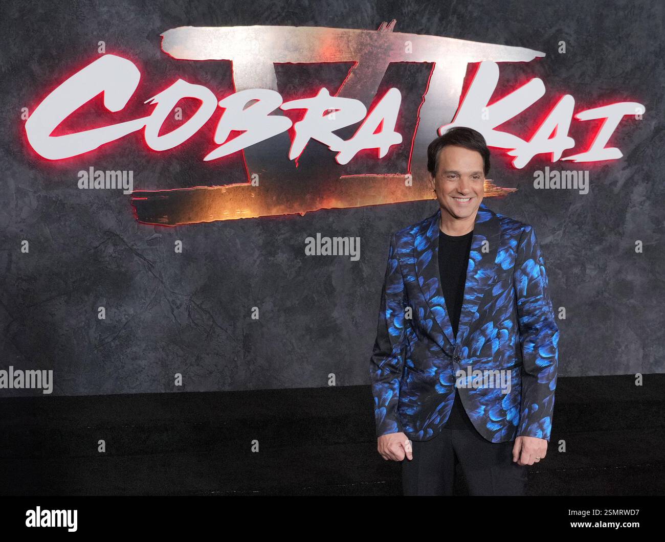 Los Angeles, USA. 12th Feb, 2025. Ralph Macchio arrives at Netflix's ...