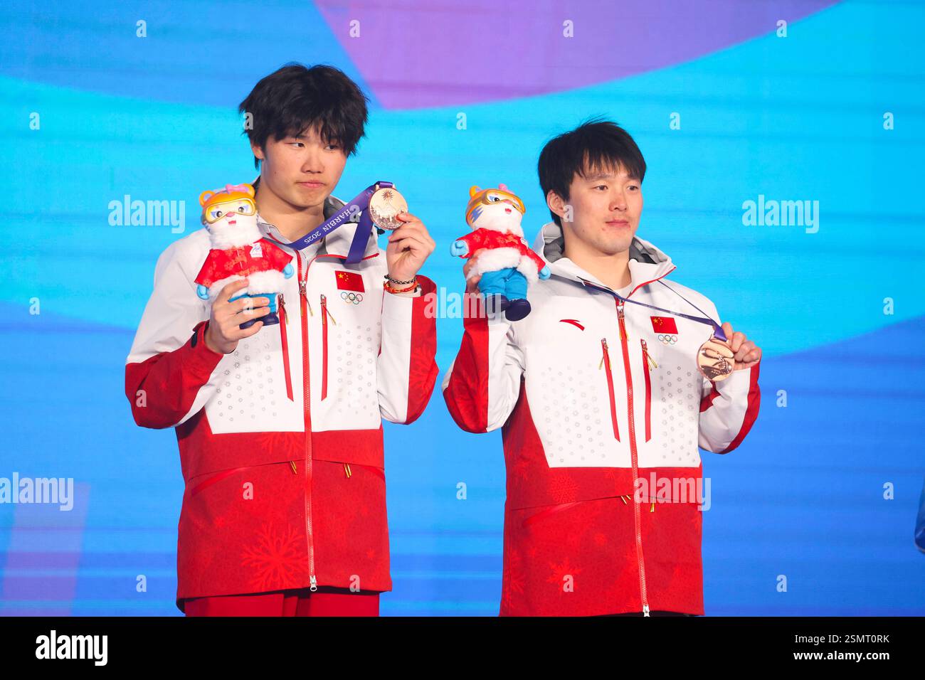 Harbin, China. 11th Feb, 2025. L-R LI Xinpeng (CHN), QI Guangpu (CHN ...