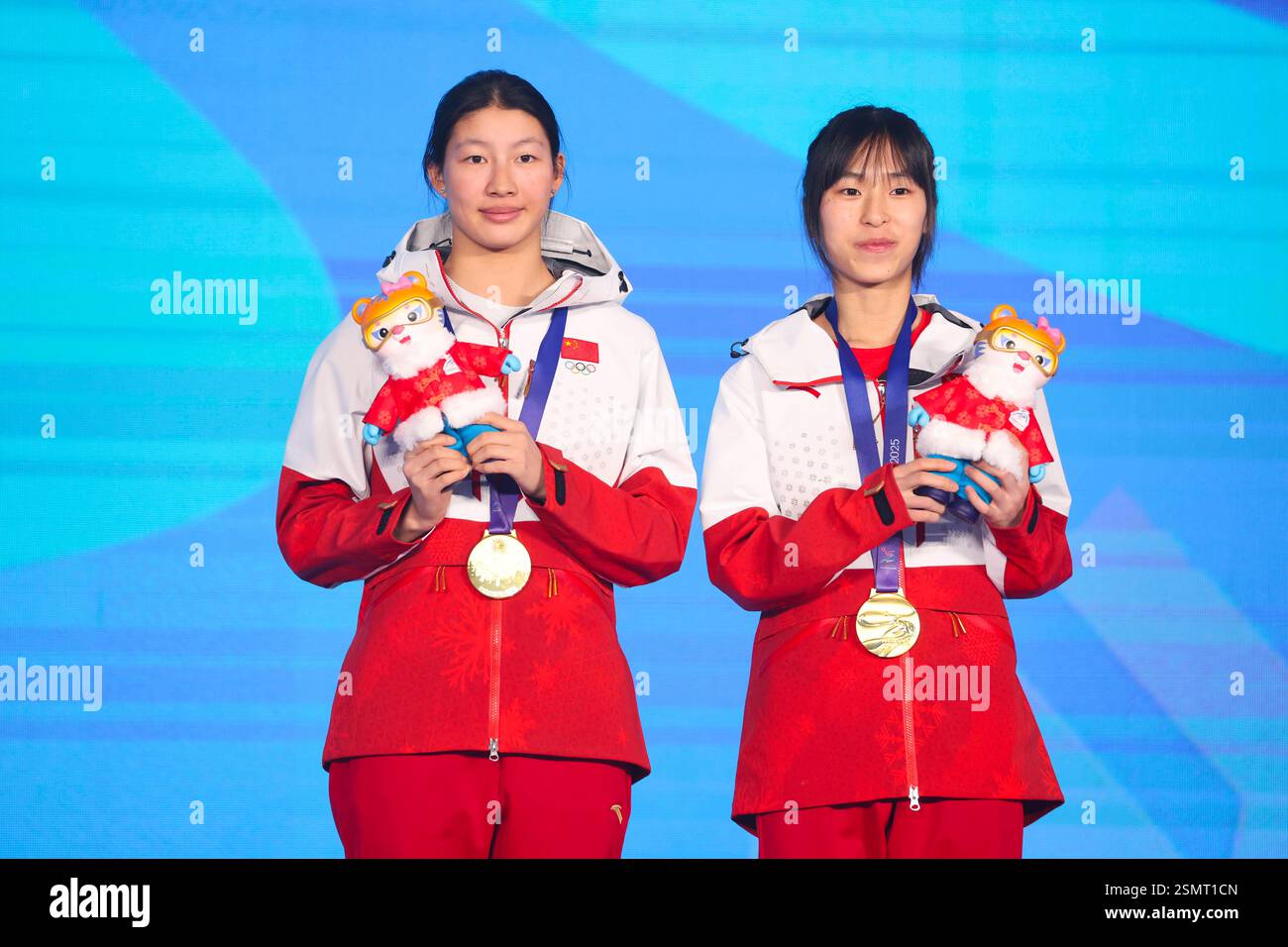 Harbin, China. 11th Feb, 2025. L-R FENG Junxi (CHN), WANG Xue (CHN ...