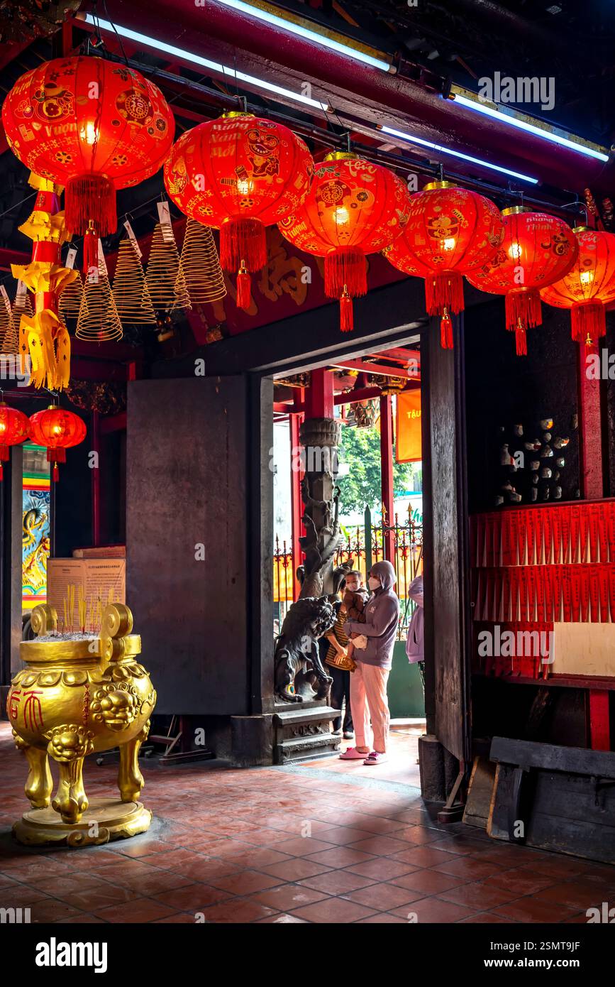 The people are visiting the Thien Hau Pagoda, a famous Chinese temple ...
