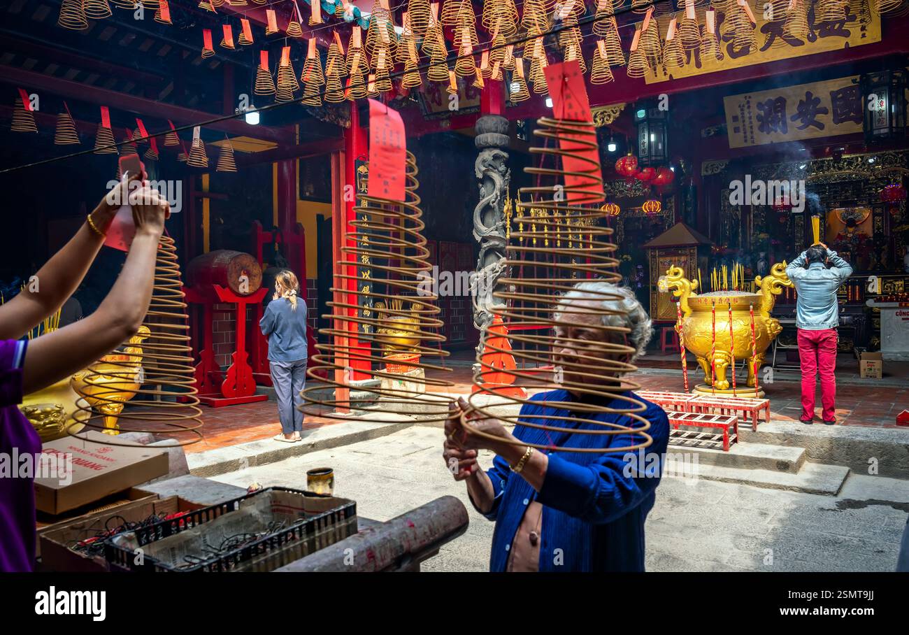 The people are visiting the Thien Hau Pagoda, a famous Chinese temple ...