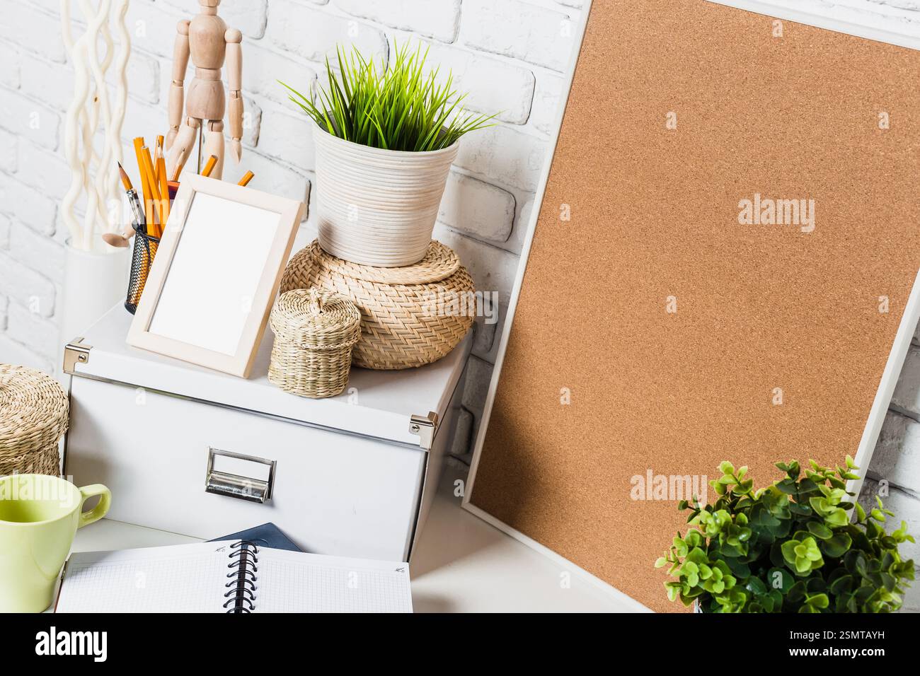 Minimalist workspace featuring greenery and organizational tools in a cozy setting Stock Photo ...
