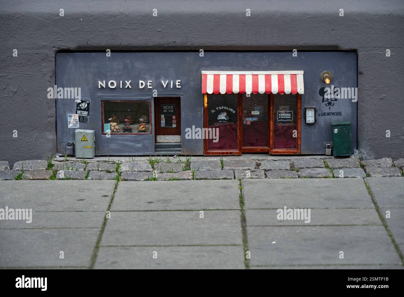 Artists Elin Westerholm and Lupus Nensén in front of the miniature nut ...