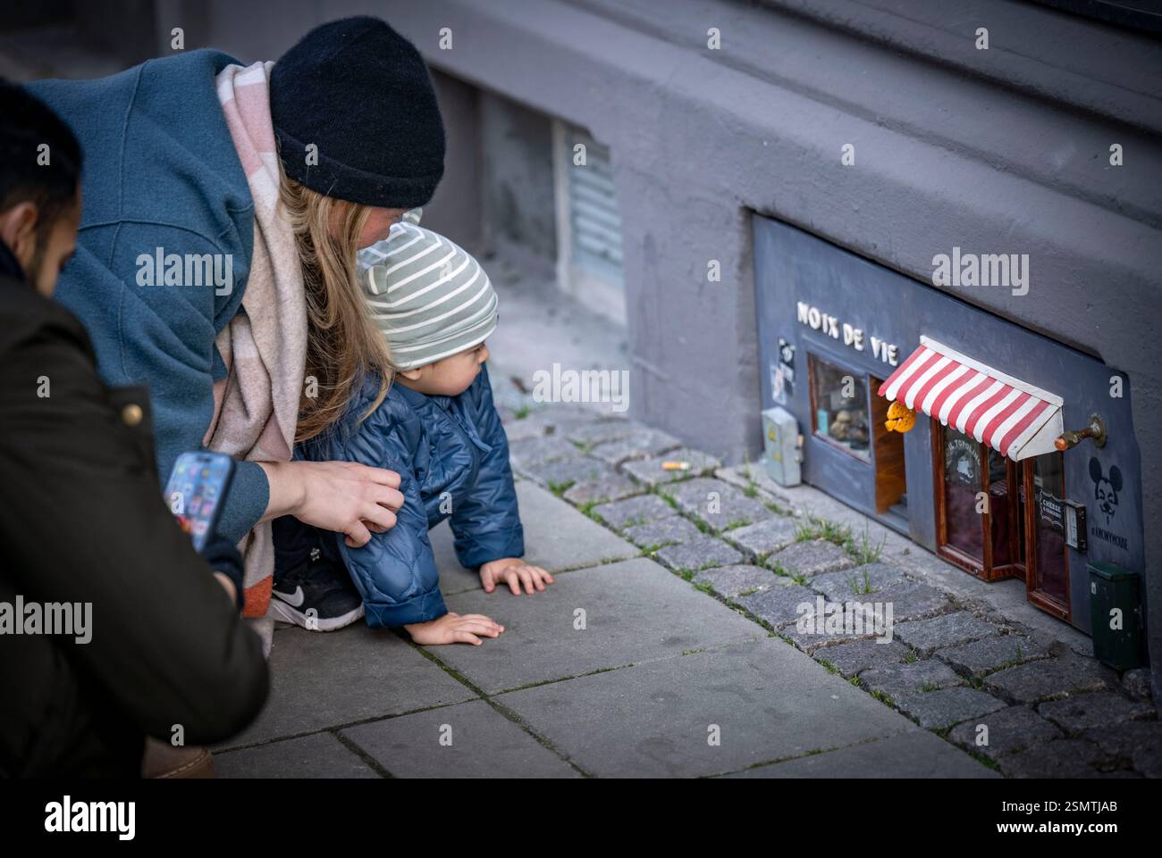 Artists Elin Westerholm and Lupus Nensén in front of the miniature nut ...