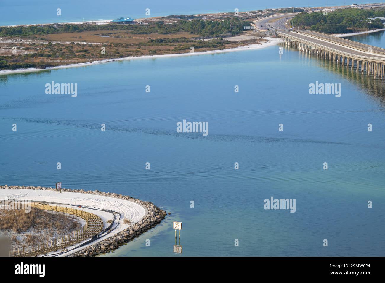 Destin, Florida, where the bridge stretches over crystal-clear waters ...