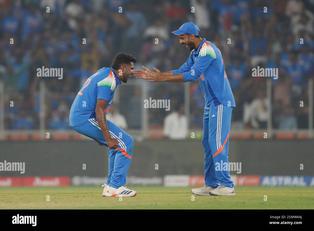 AHMEDABAD, INDIA - FEBRUARY 12: Hashit Ranna of India (L) and Axar ...