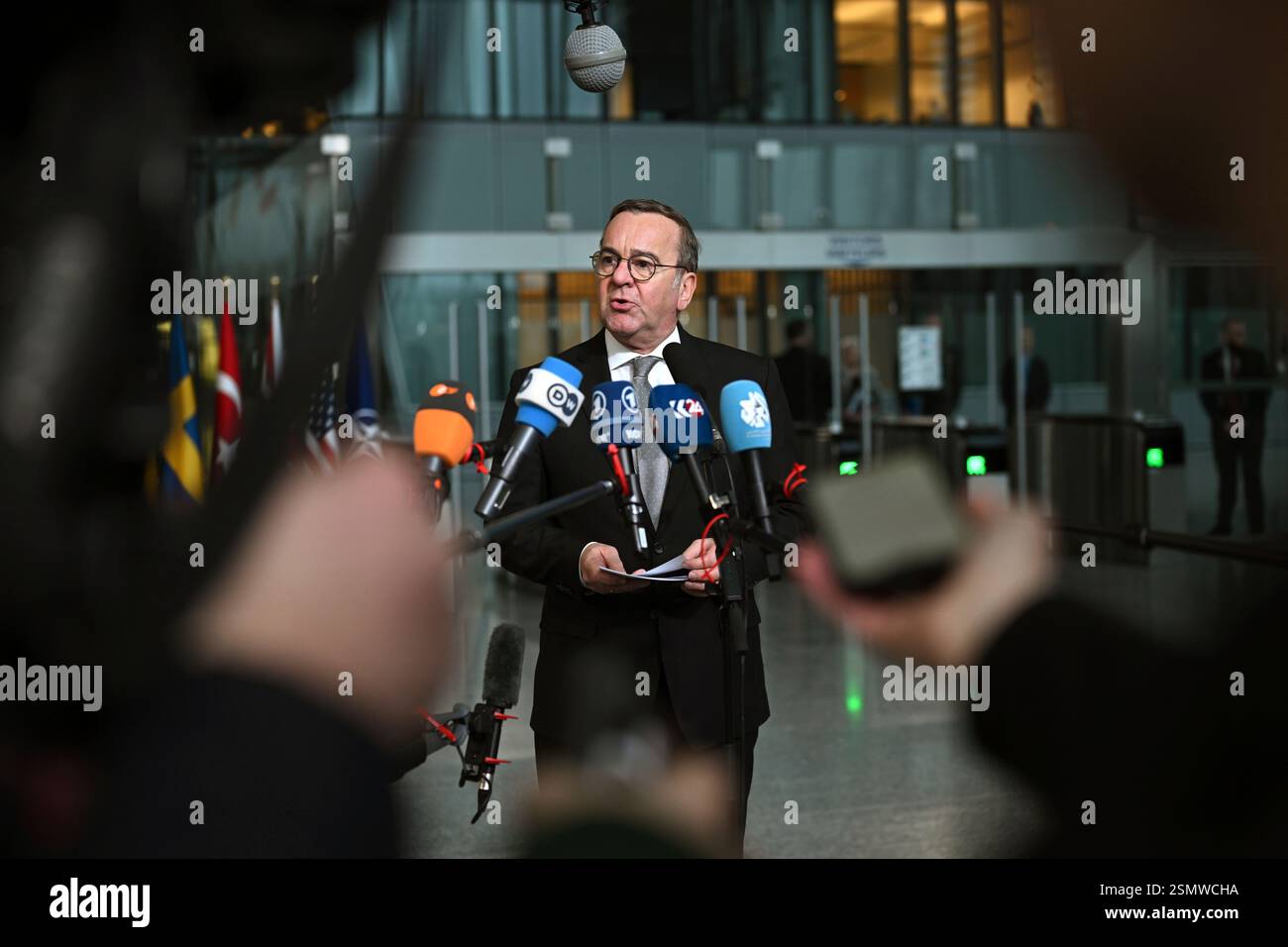 Germany's Defense Minister Boris Pistorius speaks with the media as he ...