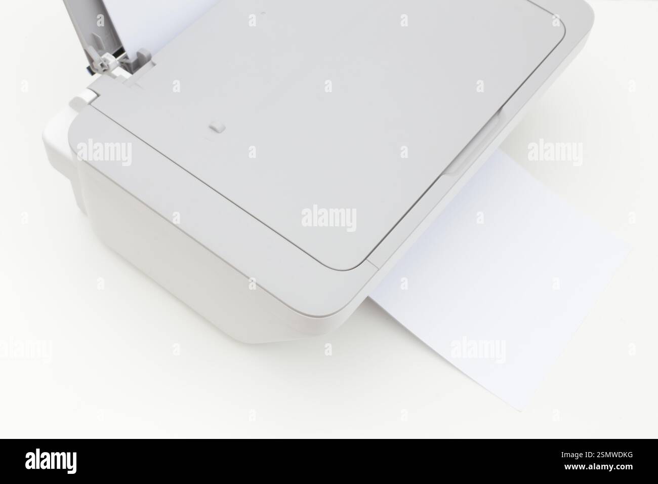 Printer in use at an office during the morning printing documents and ...