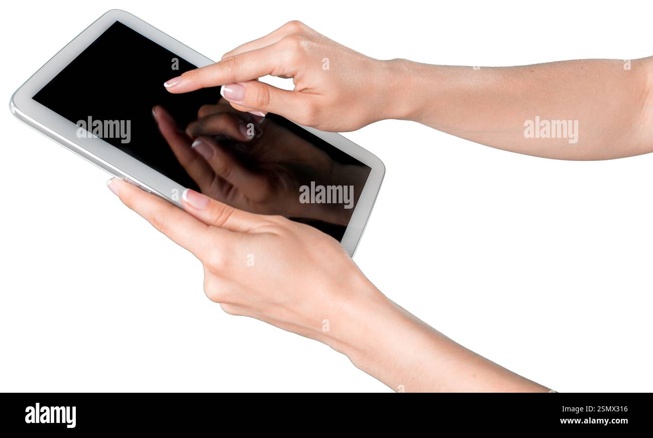 Hands interact with a touchscreen tablet displaying a black screen in a modern setting during a ...