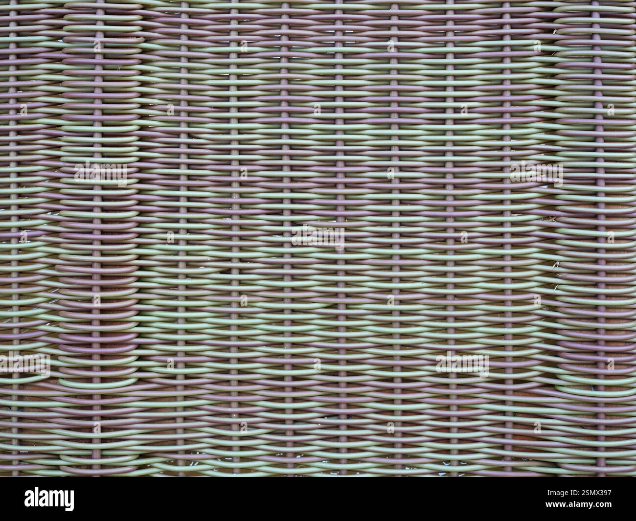 The synthetic rattan weave of a beach chair offers a decorative texture ...