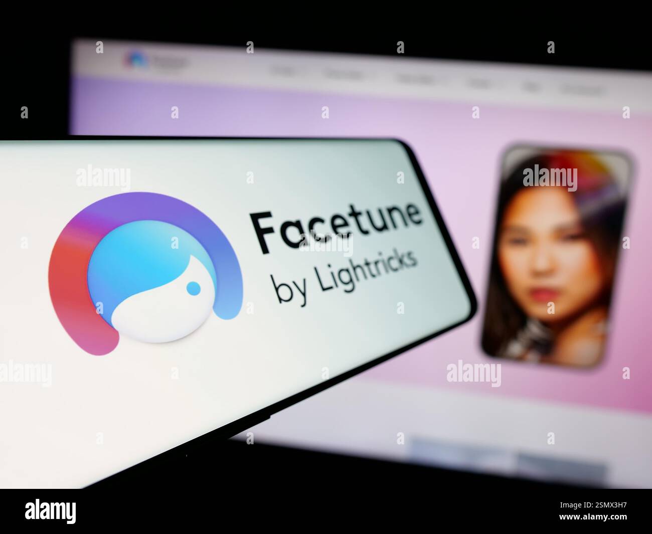 Germany. 20th Nov, 2024. In this photo illustration, a mobile phone with the logo of photo ...