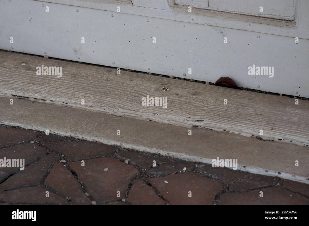 Wood threshold before a door Stock Photo - Alamy