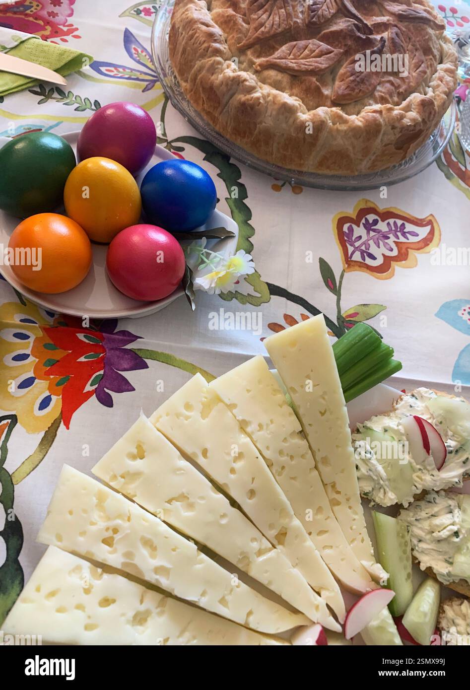 Traditional Easter food. Easter savory pie, Olivier salad, Easter eggs ...