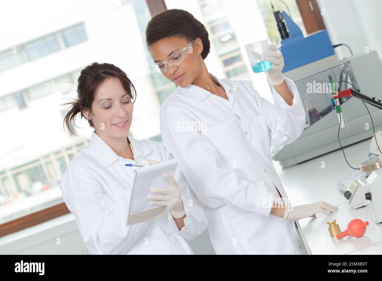 young researchers making the analysis in the modern laboratory Stock ...