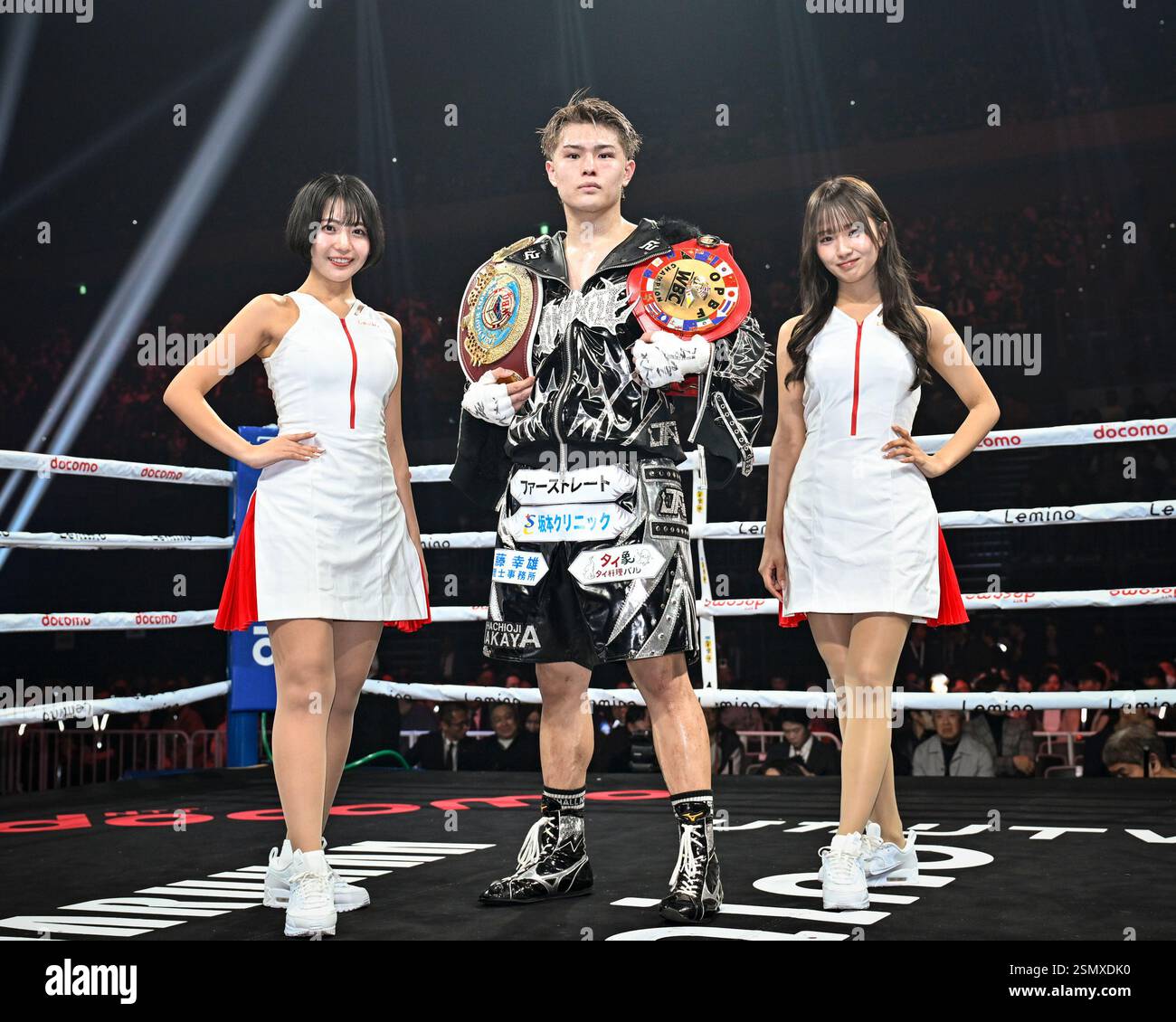 Tokyo, Japan. 24th Jan, 2025. Champion Jin Sasaki poses with his championship belts after ...
