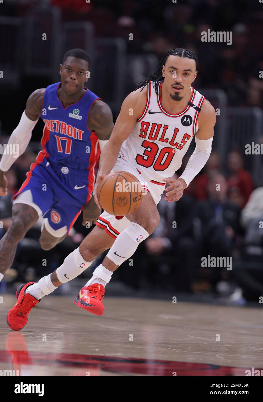 CHICAGO, IL - FEBRUARY 12: Tre Jones #30 of the Chicago Bulls brings ...