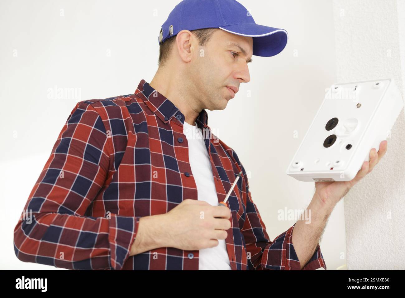Man repairing device cooling hi-res stock photography and images - Alamy