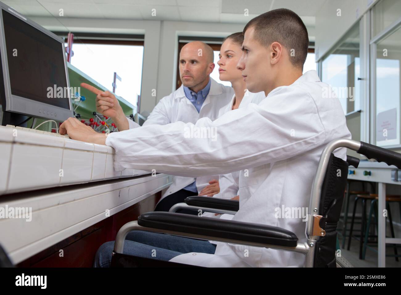 Researcher lab wheelchair hi-res stock photography and images - Alamy