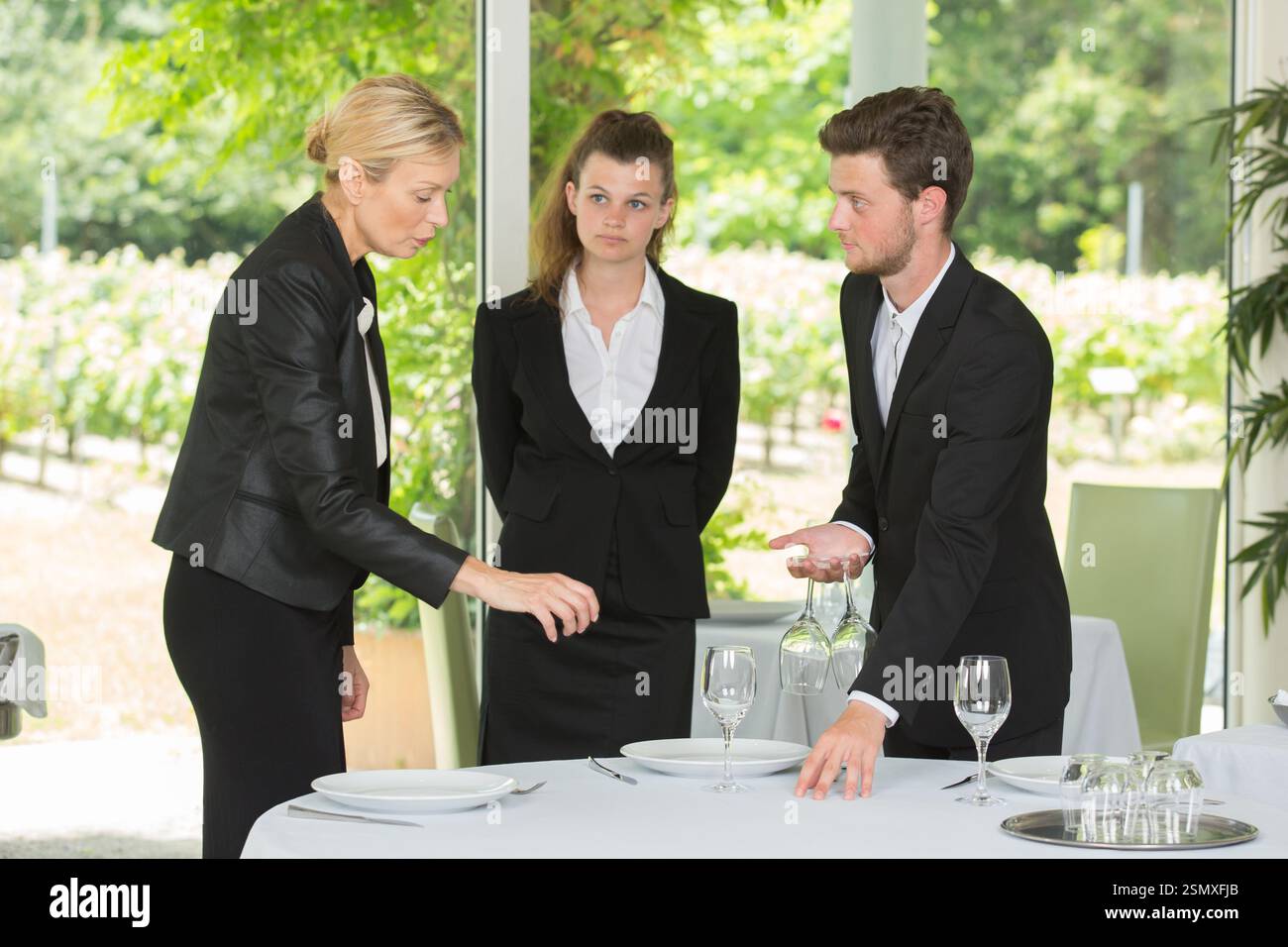 group of waiters and waitresses at work Stock Photo - Alamy