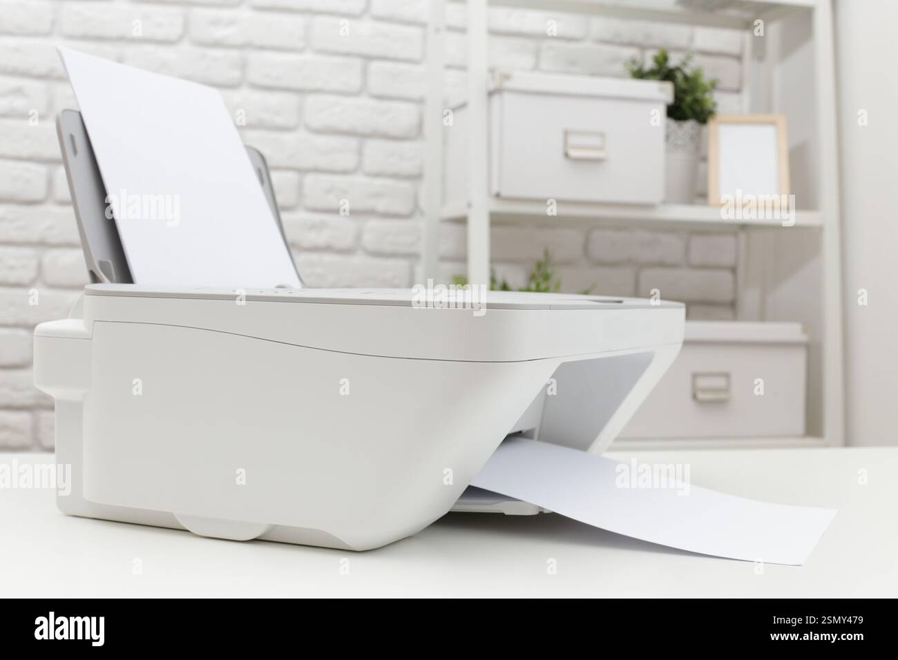 Modern printer in a well-organized workspace printing documents on ...