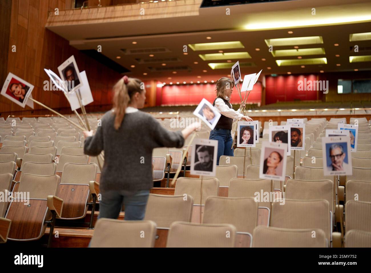 Staff members use "heads on sticks" to check camera blocking at the ...