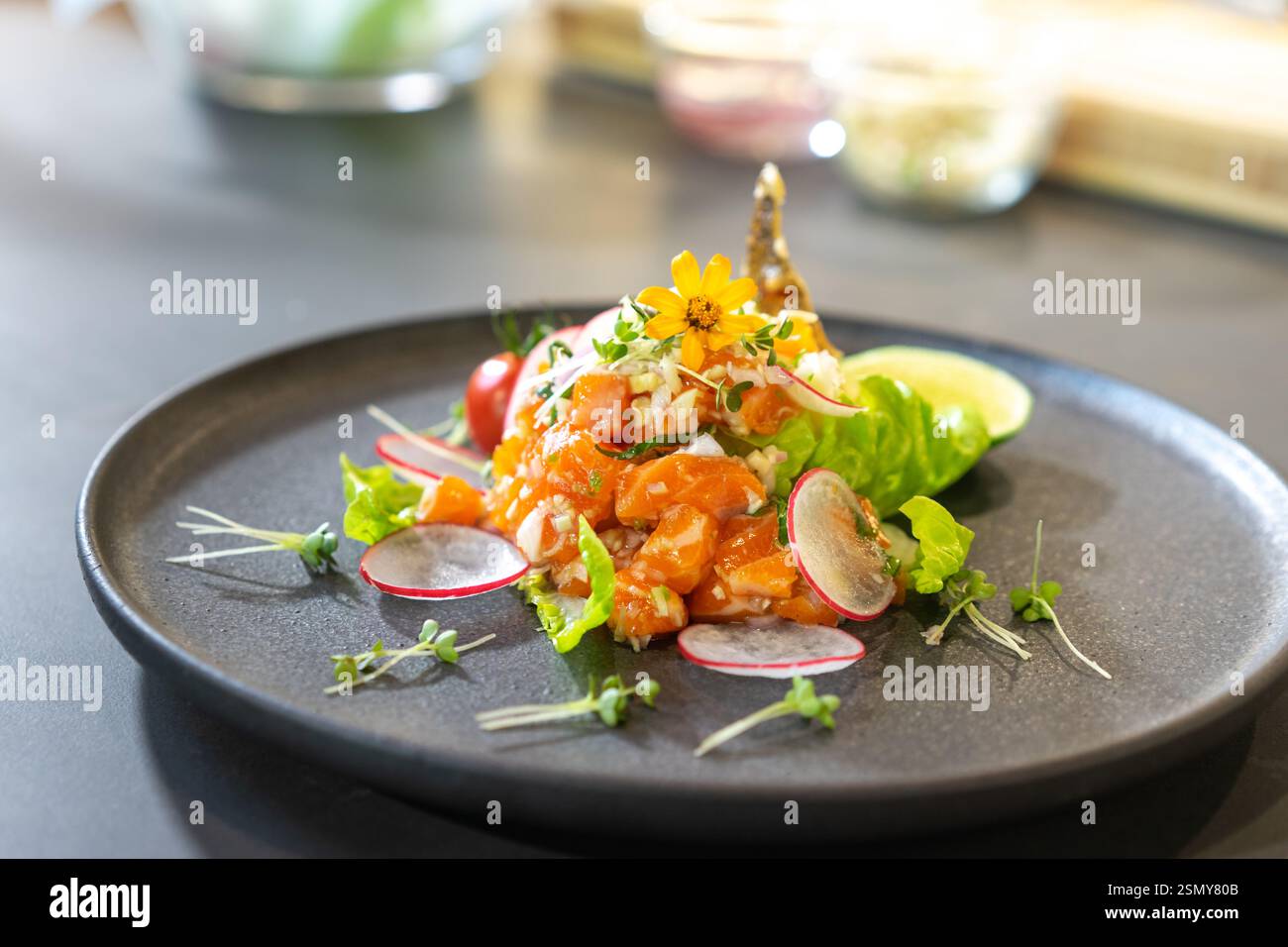Spicy Raw Salmon Salad Thai food style decorated with Crispy fried fish ...