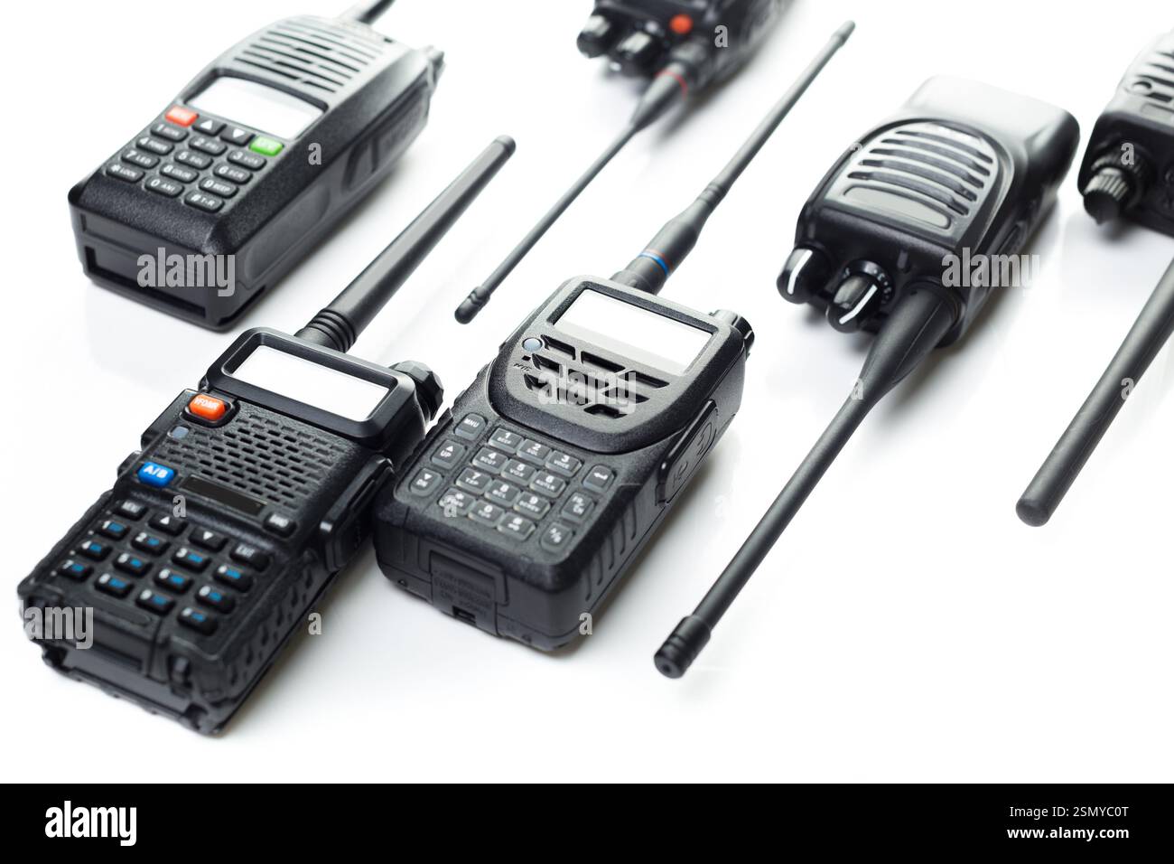 Various models of two-way radios displayed on a white background for ...