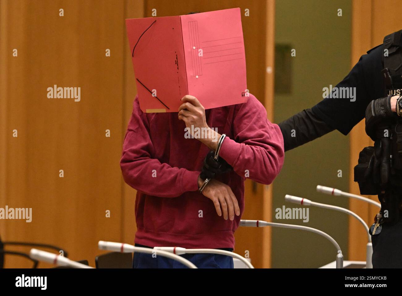 Stuttgart, Germany. 13th Feb, 2025. The defendant Sulaiman A. is led to ...