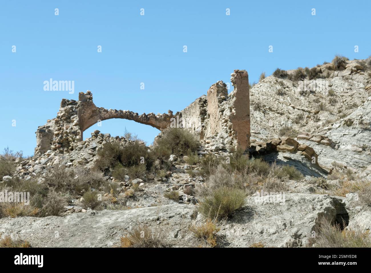 Derelict building in eroded desert landscape, Tabernas Desert, Almeria ...