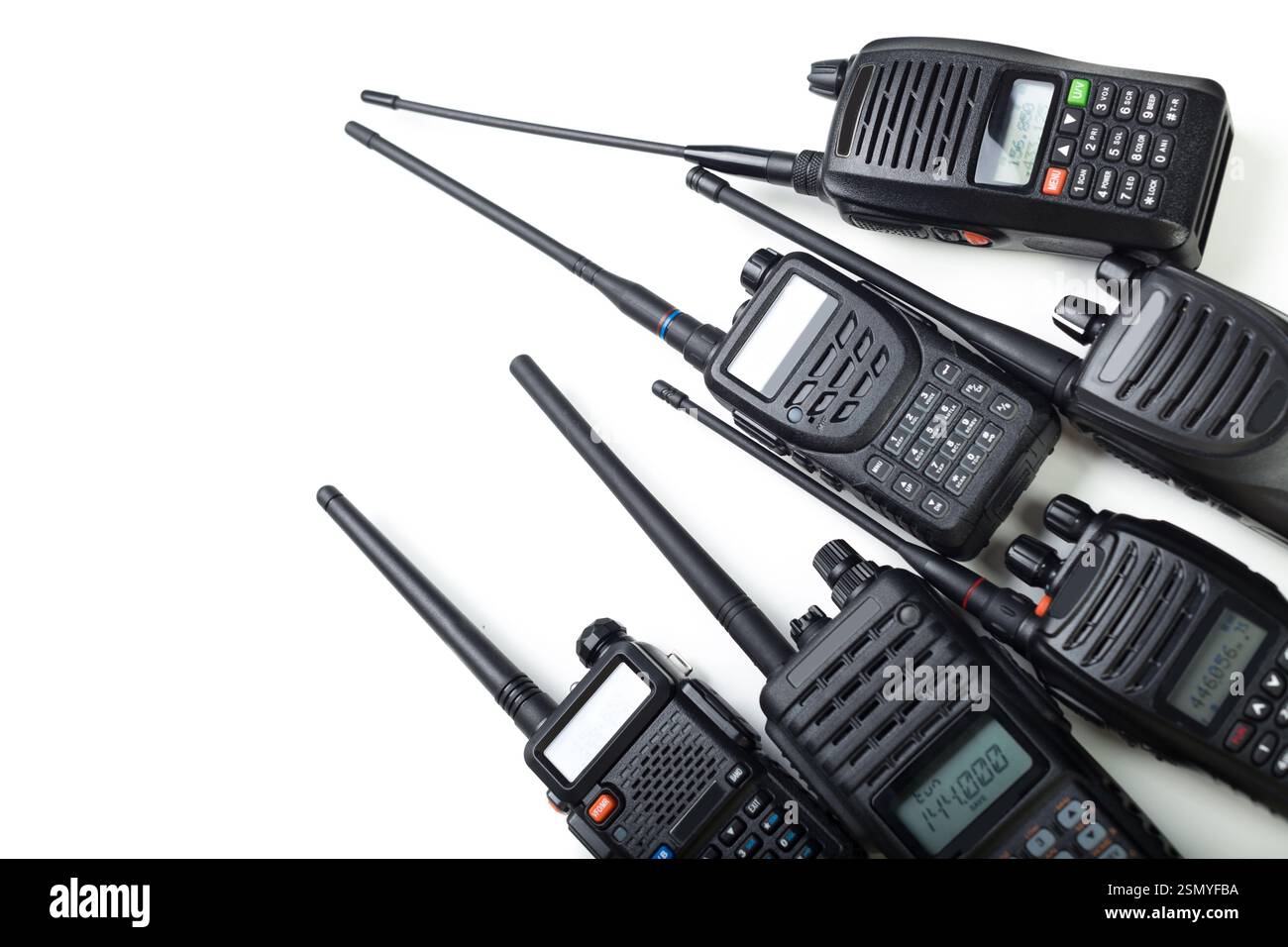 Collection of two-way radios displayed on a white background showcasing ...