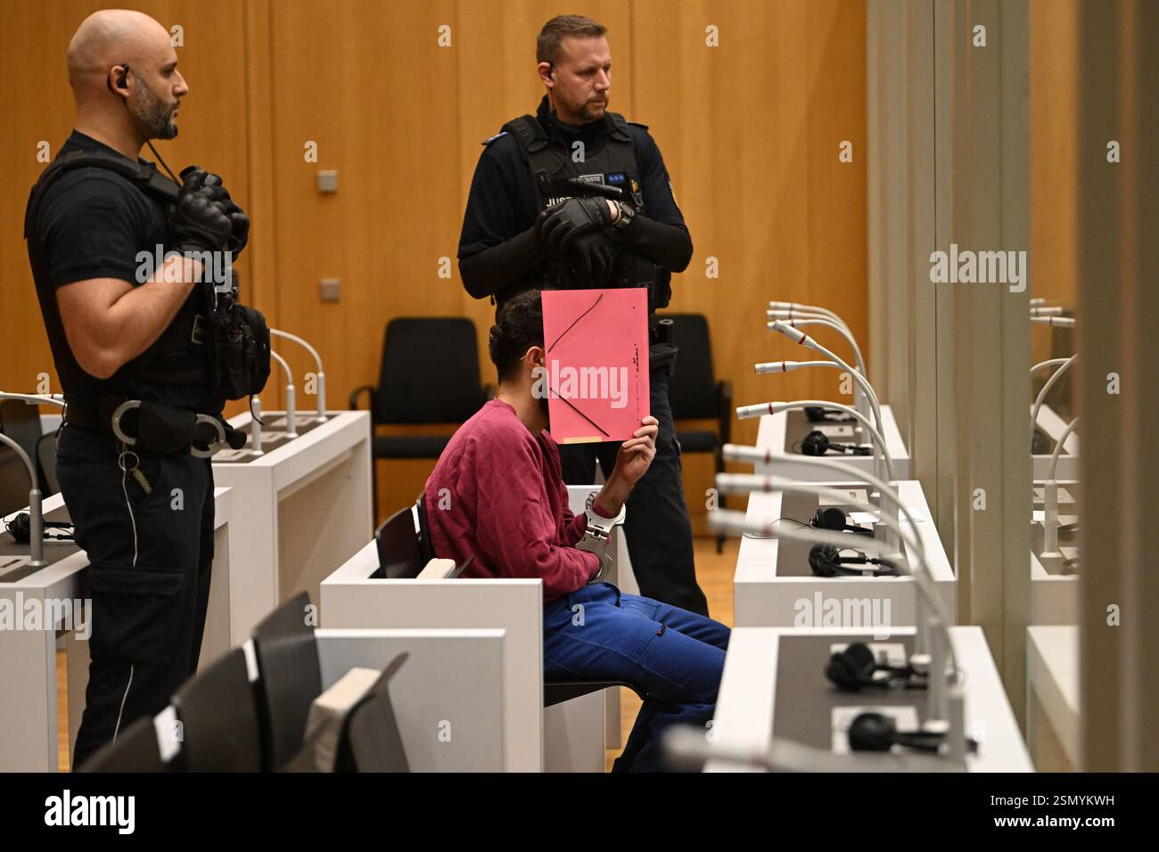 Stuttgart, Germany. 13th Feb, 2025. The defendant Sulaiman A. sits in ...