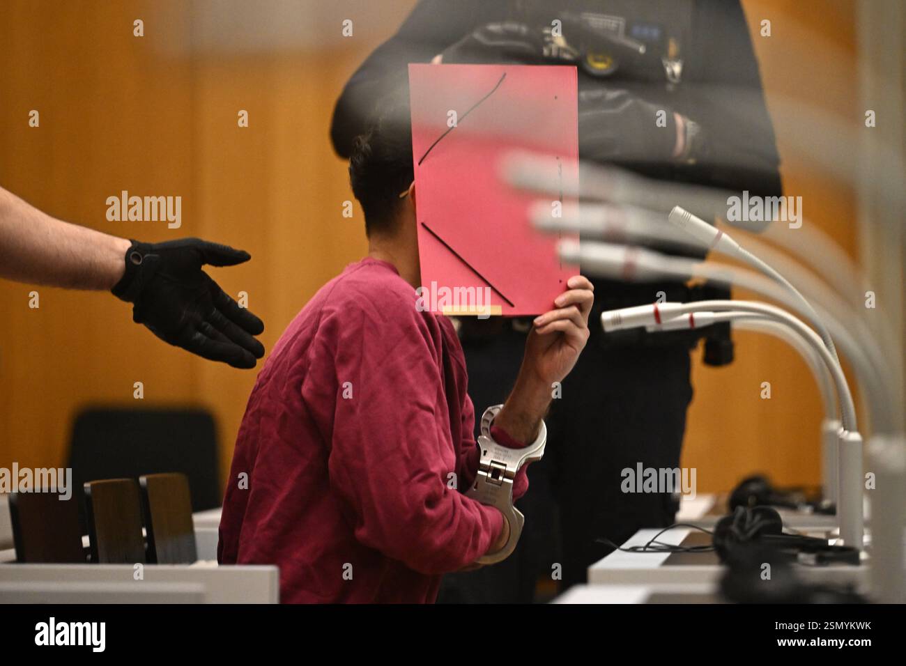 Stuttgart, Germany. 13th Feb, 2025. The accused Sulaiman A. sits in his ...