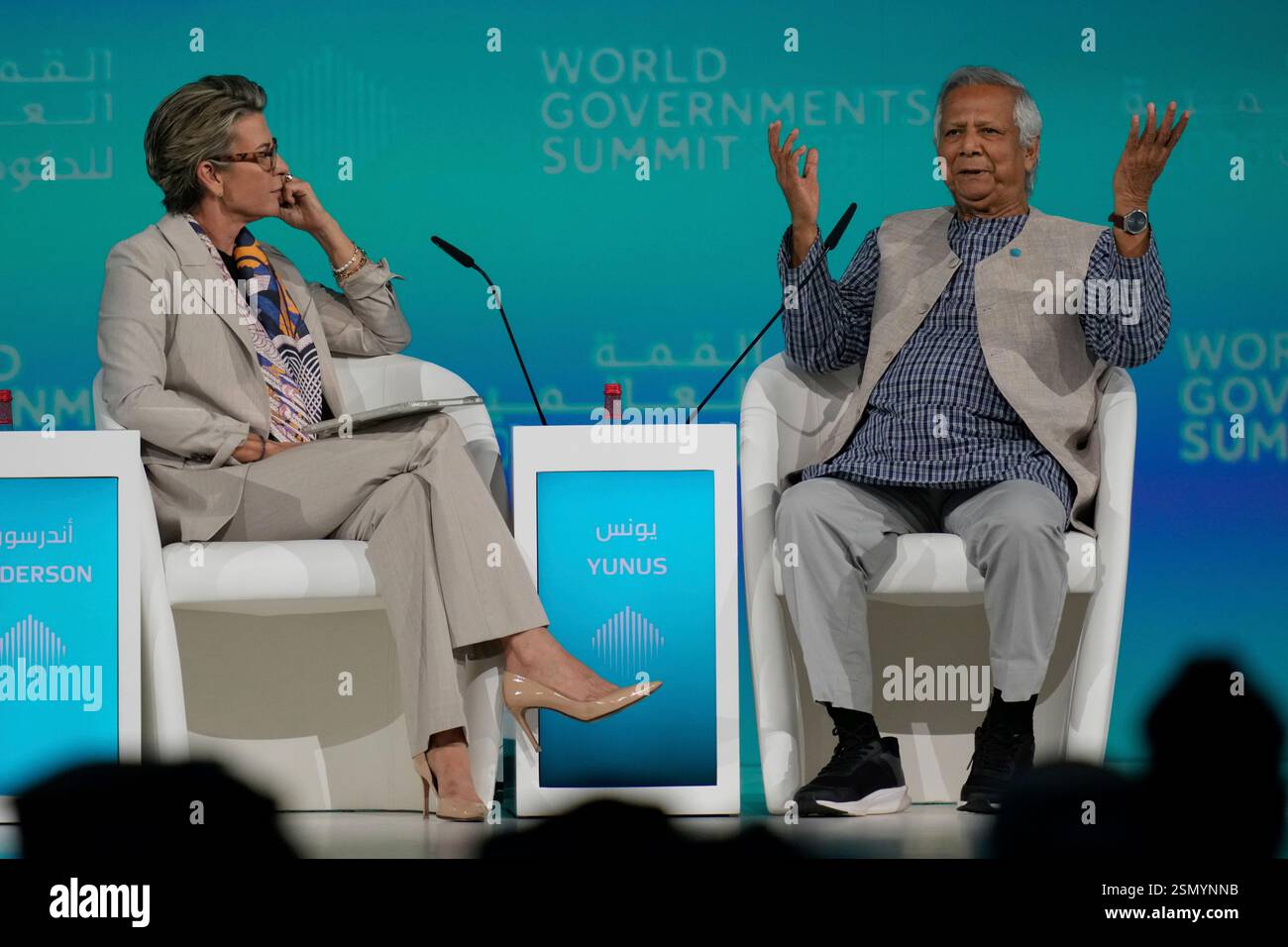 Muhammad Yunus, right, chief adviser to Bangladesh's interim government ...