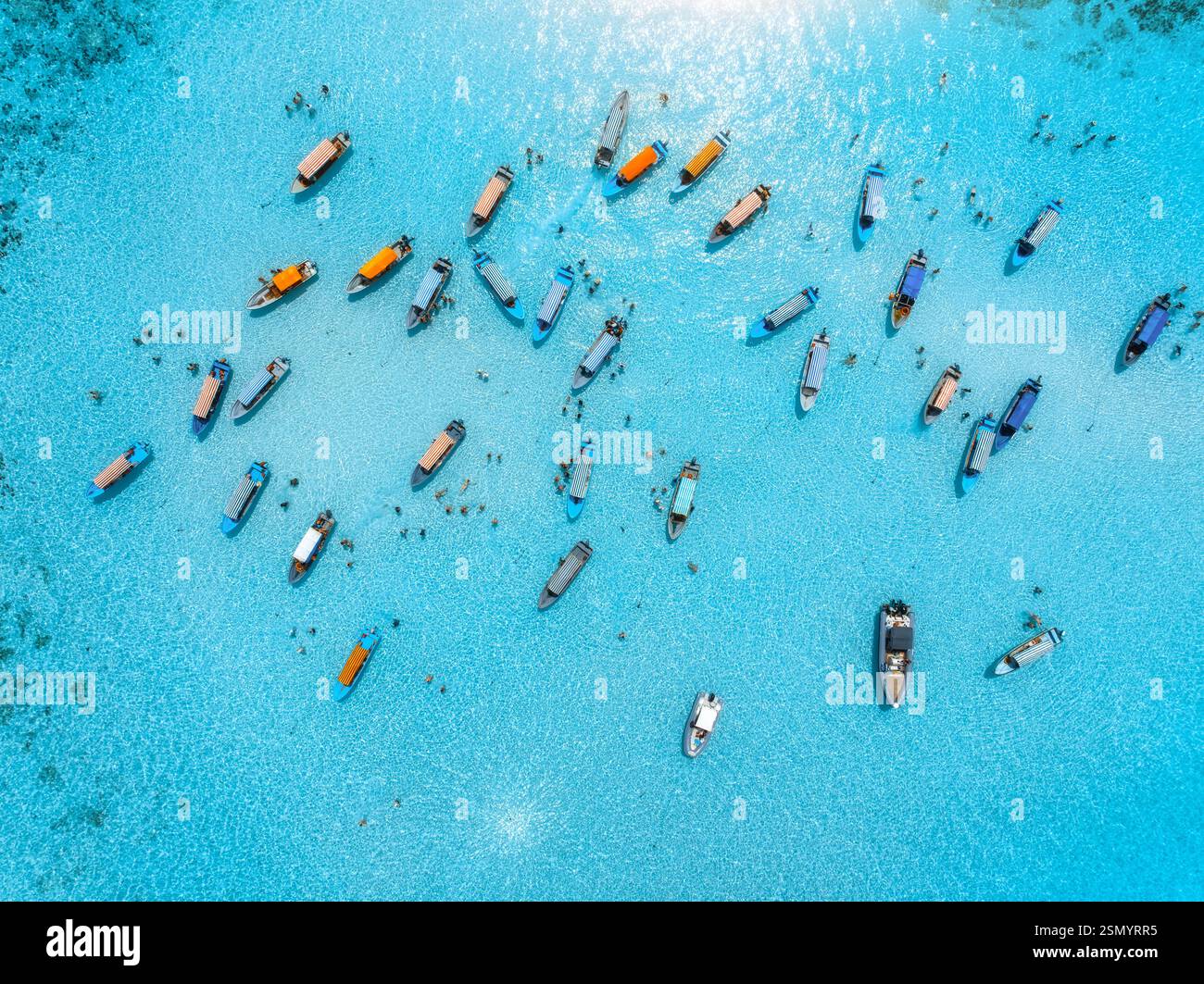 Aerial view of colorful boats, sea bay with azure water in summer Stock ...