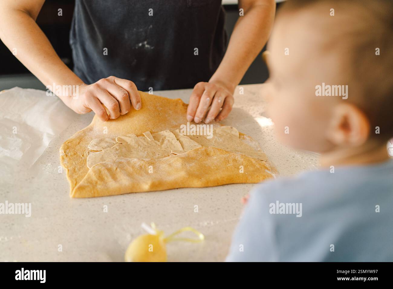 Mother and child are baking. Homemade food and little helper Stock ...