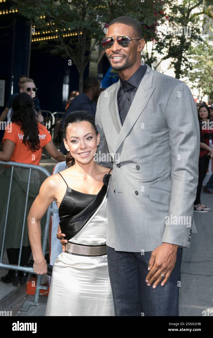 Chris Bosh and Adrienne Bosh attend the premiere of 'The Carter Effect ...