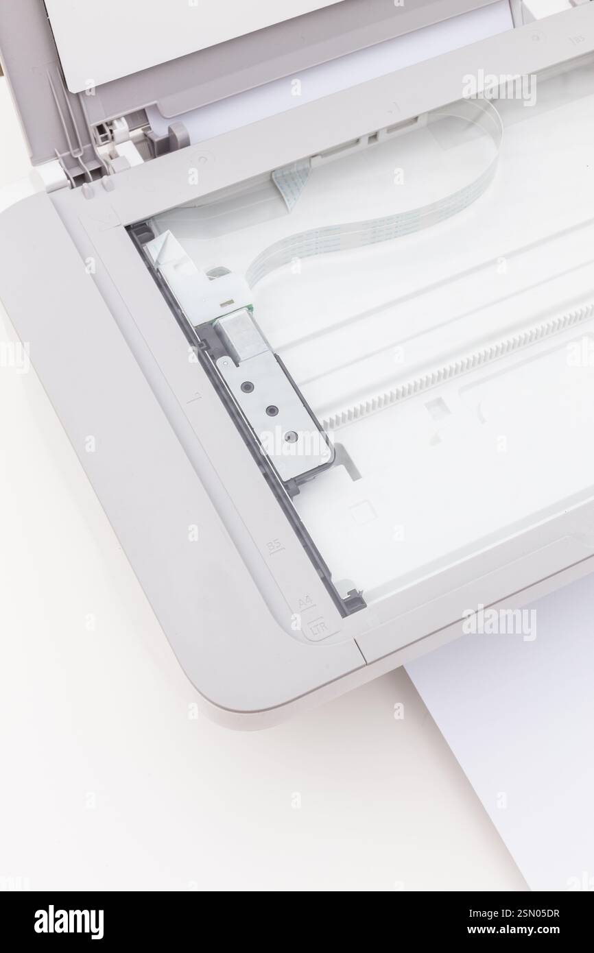 Modern scanner showing internal mechanism and paper path on a clean ...