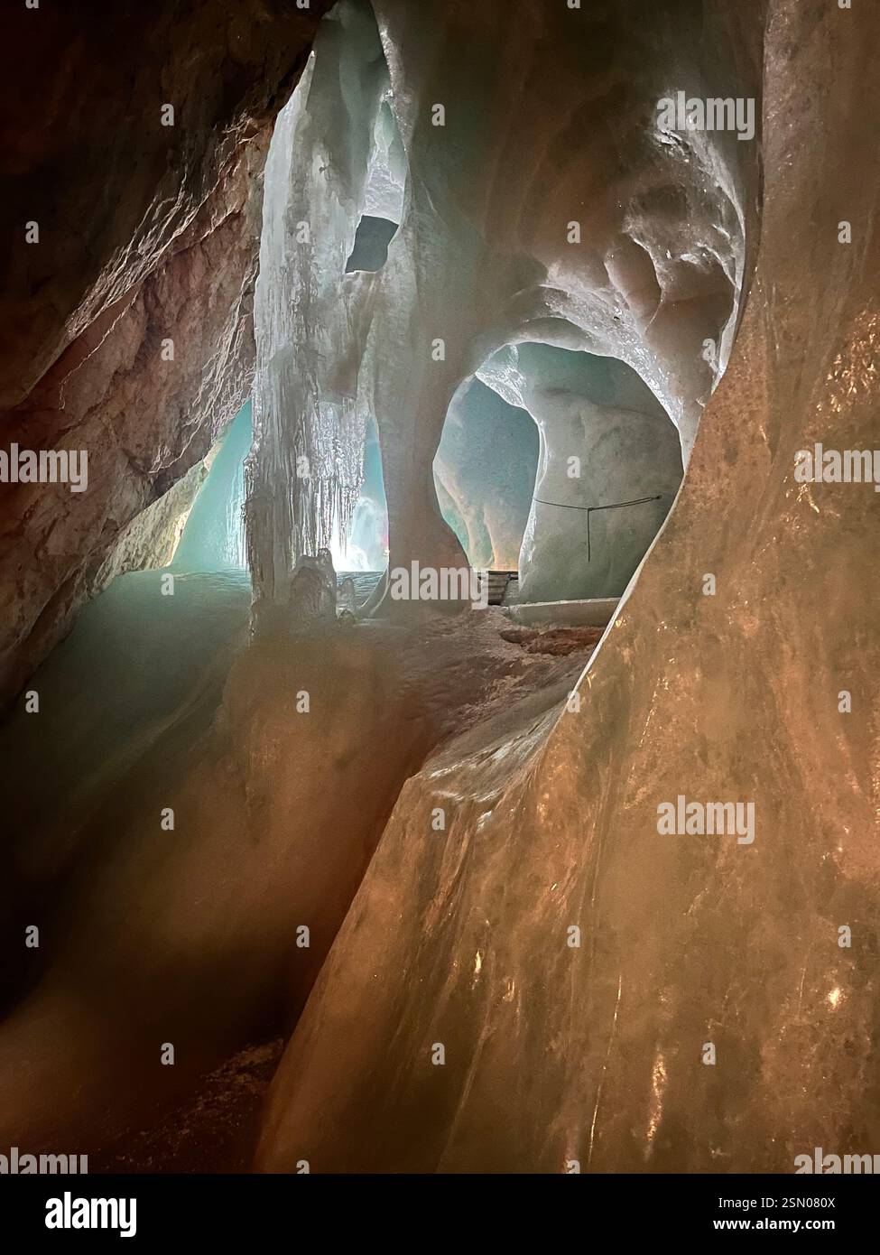 A peek into an ice cave of Austrian alps Stock Photo - Alamy