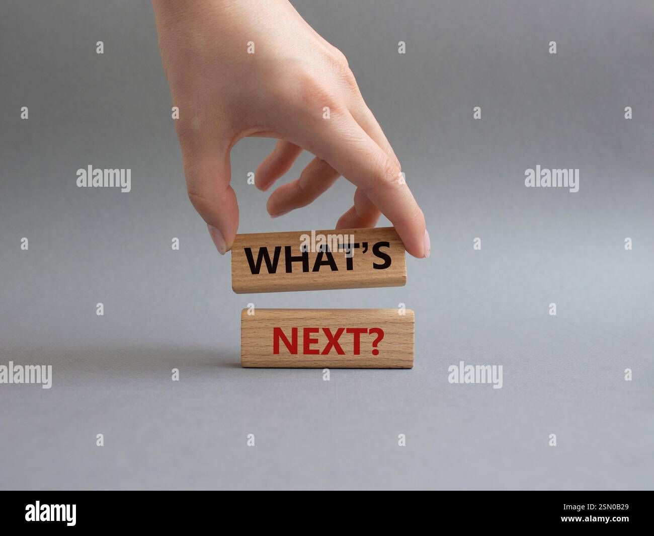 What is next symbol. Concept word What is next on wooden blocks ...