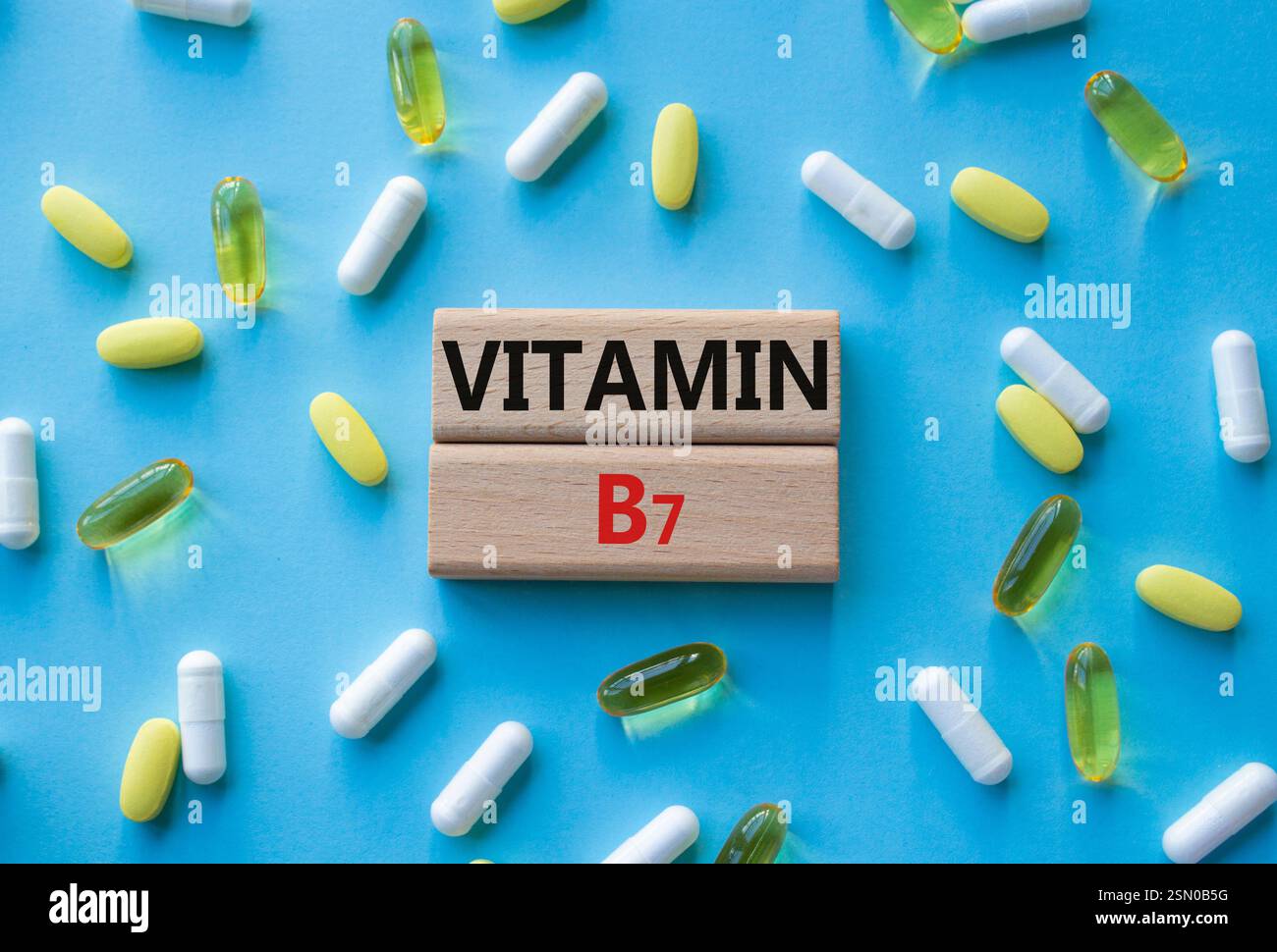 Vitamin B7 symbol. Concept word Vitamin B7 on wooden blocks. Beautiful ...